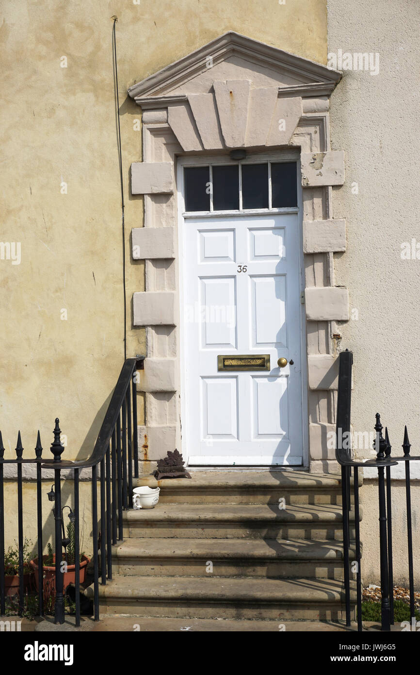Ornate Victorian House Doorway with White Door and Steps and Railings ...