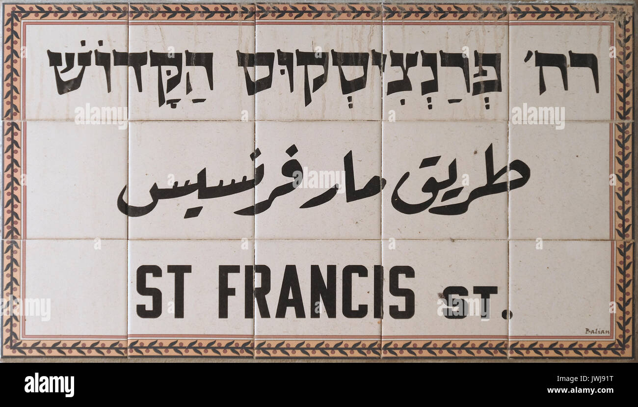 Glazed ceramic street sign in English Hebrew and Arabic of Saint ...
