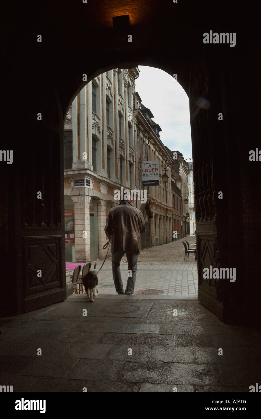 The Frenchman and his dog in Lille, France Stock Photo - Alamy