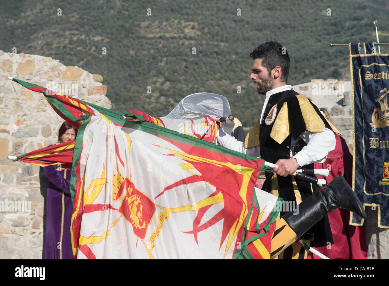 Flag throwing during medieval festival in the historic city of Taggia ...