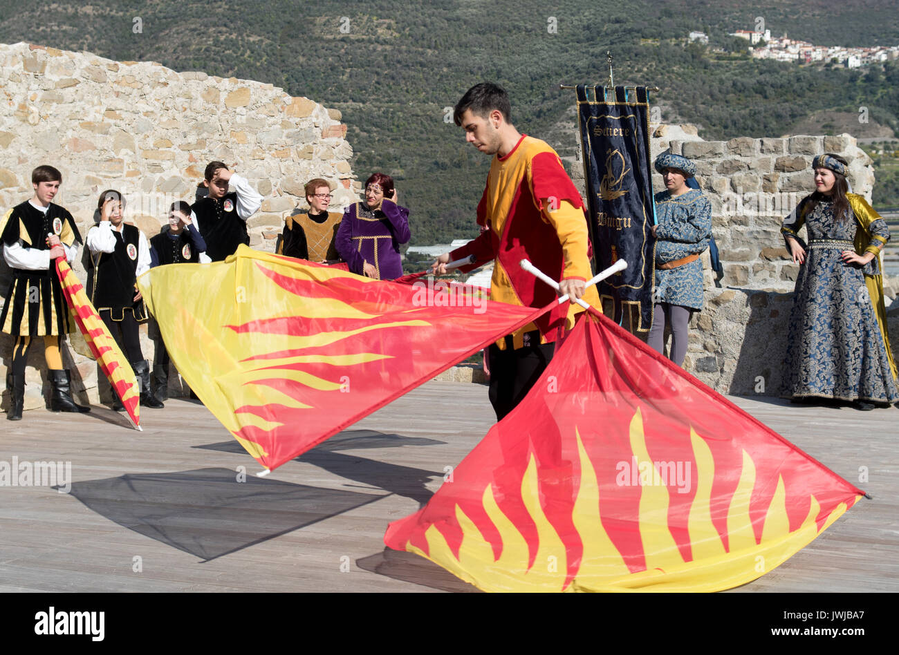 Flag throwing during medieval festival in the historic city of Taggia ...