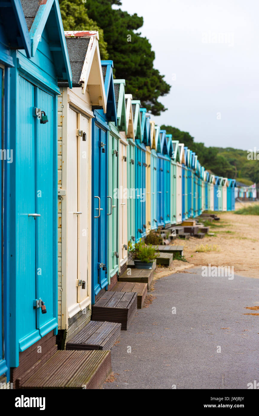 Colourful Beach Huts, invarious shades of Blue Stock Photo - Alamy