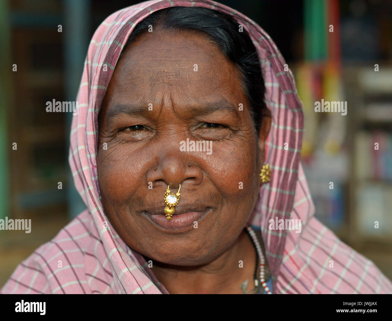 Chubby Indian Adivasi woman with tribal nose jewellery poses for the ...