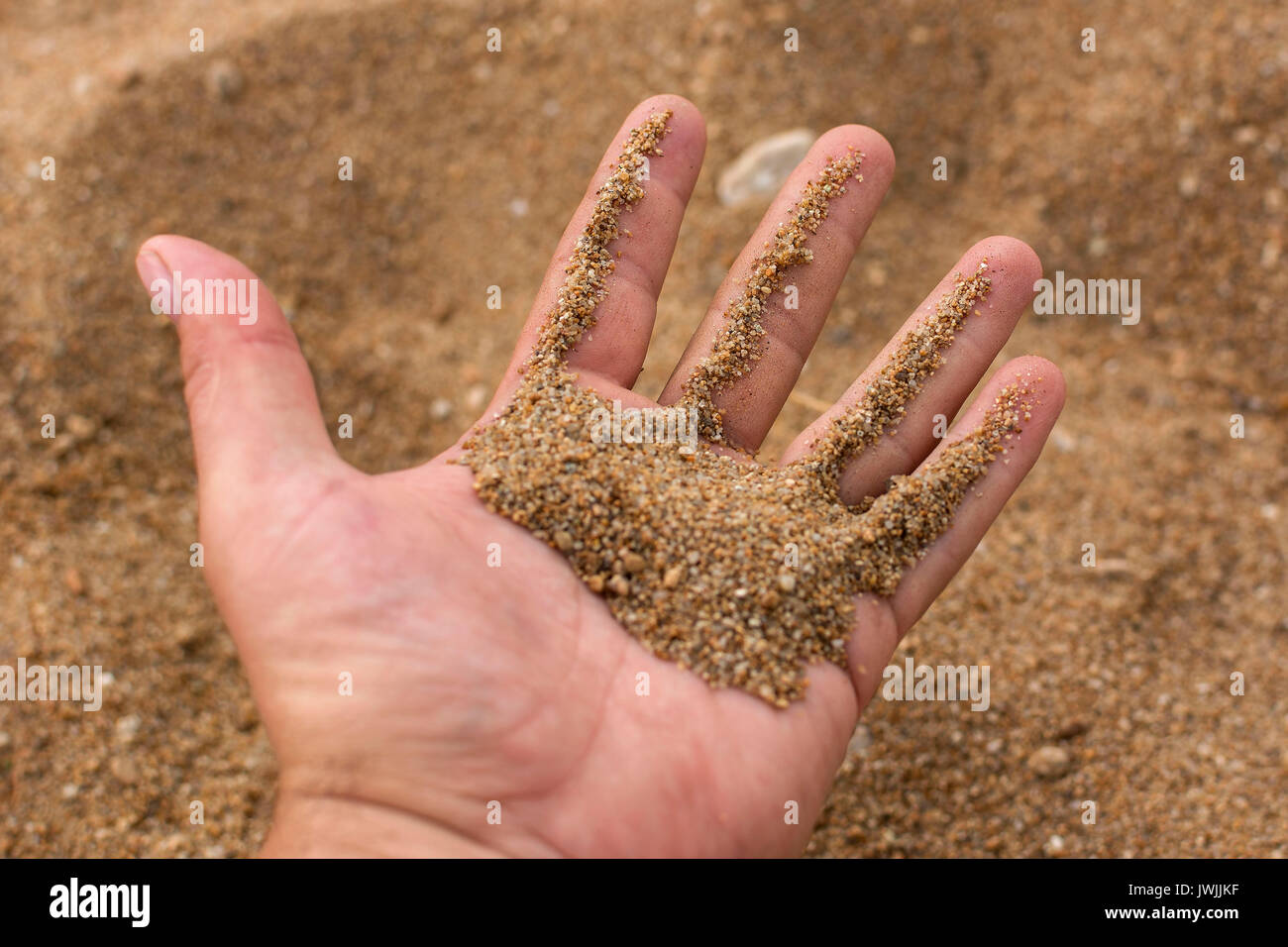 image of Hand holding sand. Summer beach holiday vacation concept Stock ...