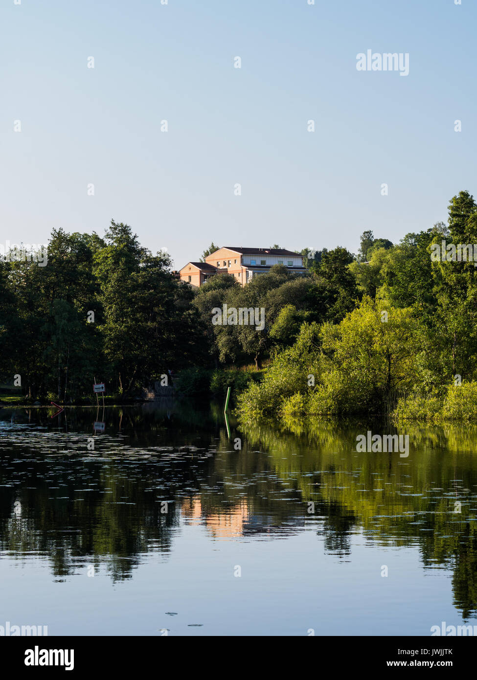 Building covered with trees hi-res stock photography and images - Alamy
