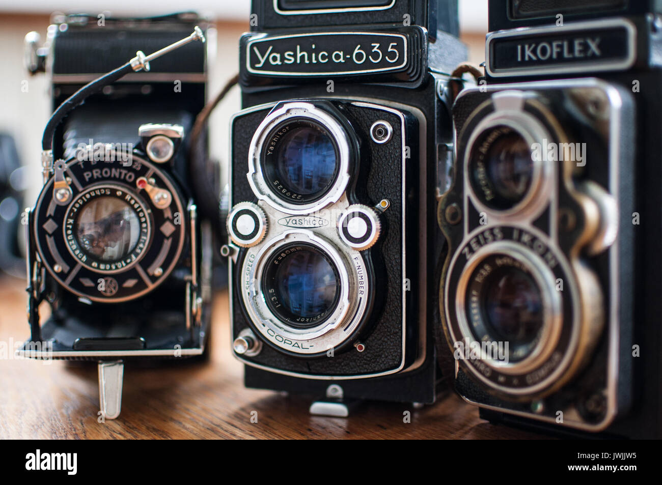Three vintage cameras Stock Photo - Alamy