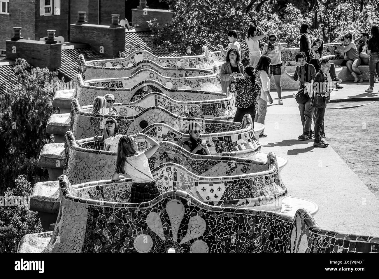 Typical Gaudi style mosaic benches at Park Guell in Barcelona ...