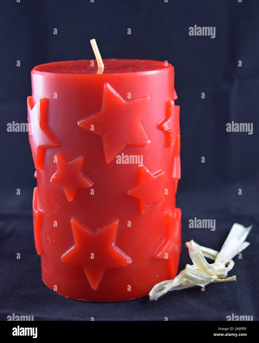 christmas candle with star pattern, tempus ante natale domini ...