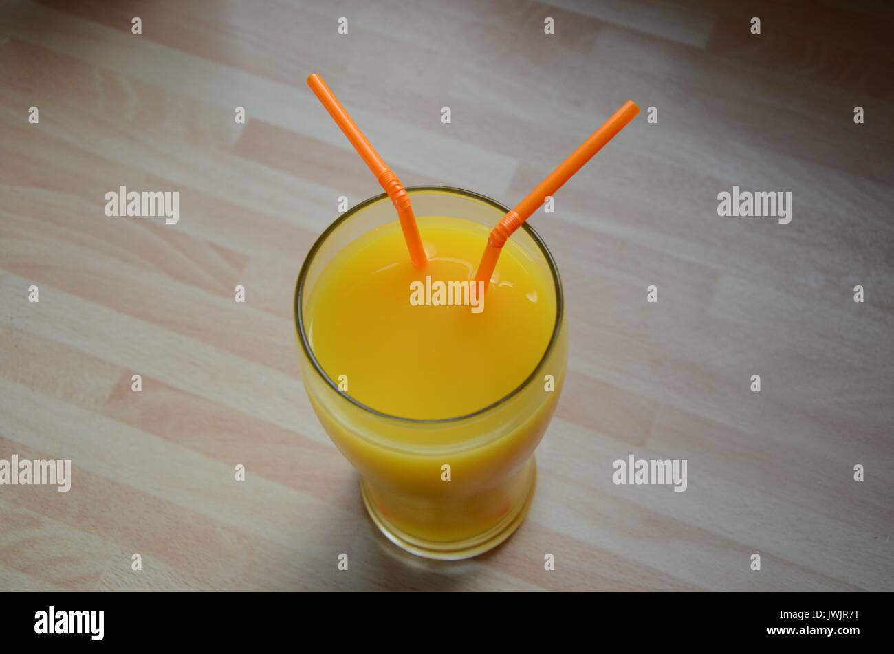 five a day, Fresh squeezed pint of orange juice Stock Photo - Alamy