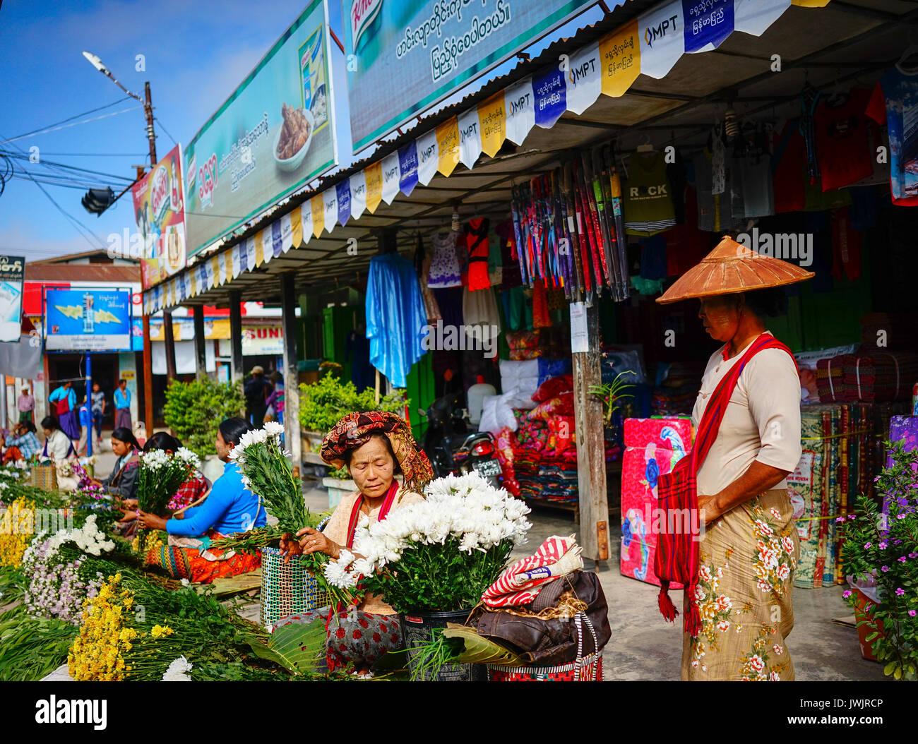 Yangon, Myanmar - Oct 17, 2015. Vendors selling flowers at the rural ...