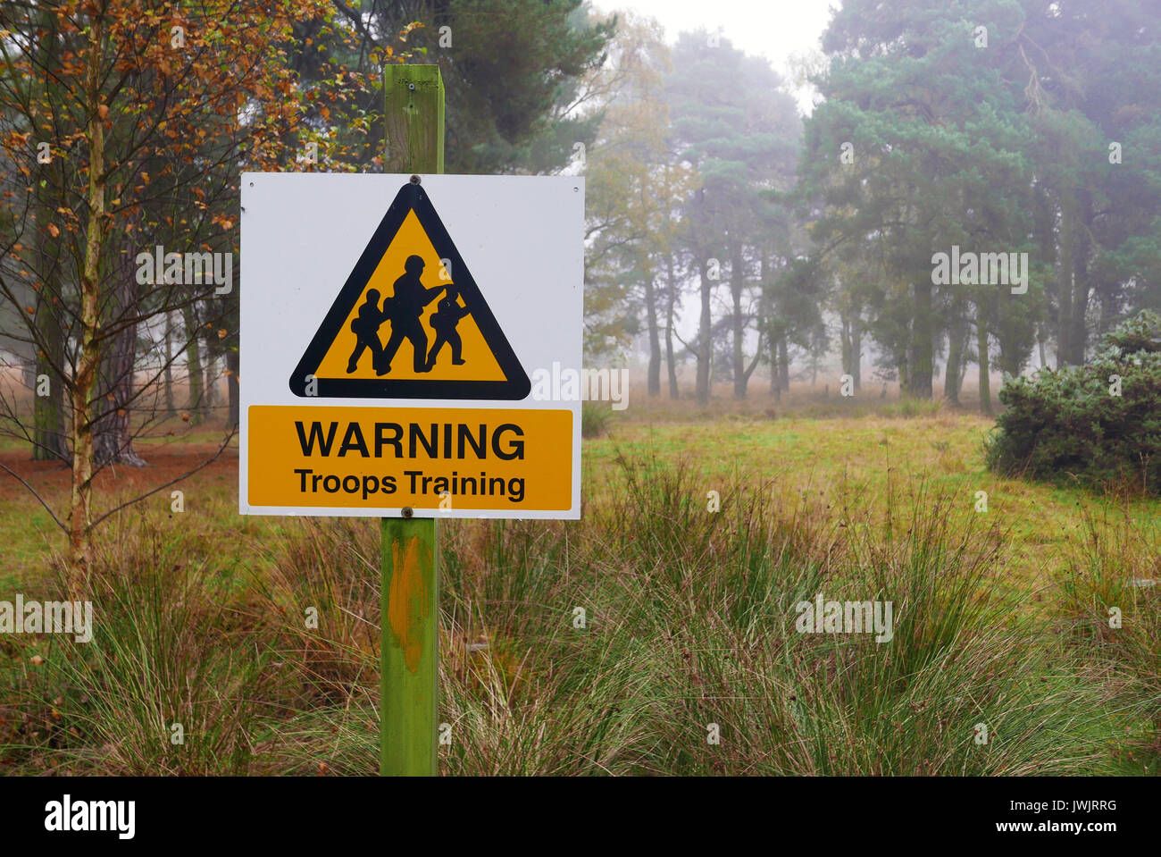 Troop warning sign in wooded training area Stock Photo - Alamy