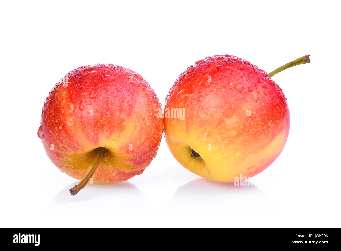 Dwarf Apple with drops of water isolated on white background Stock ...