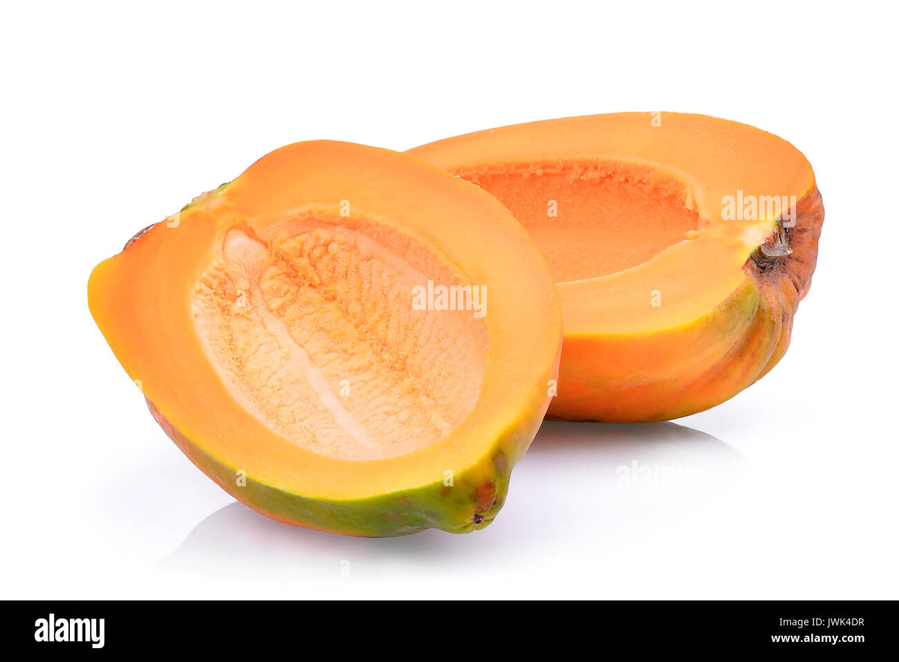 half of fresh papaya seedless isolated on white background Stock Photo ...