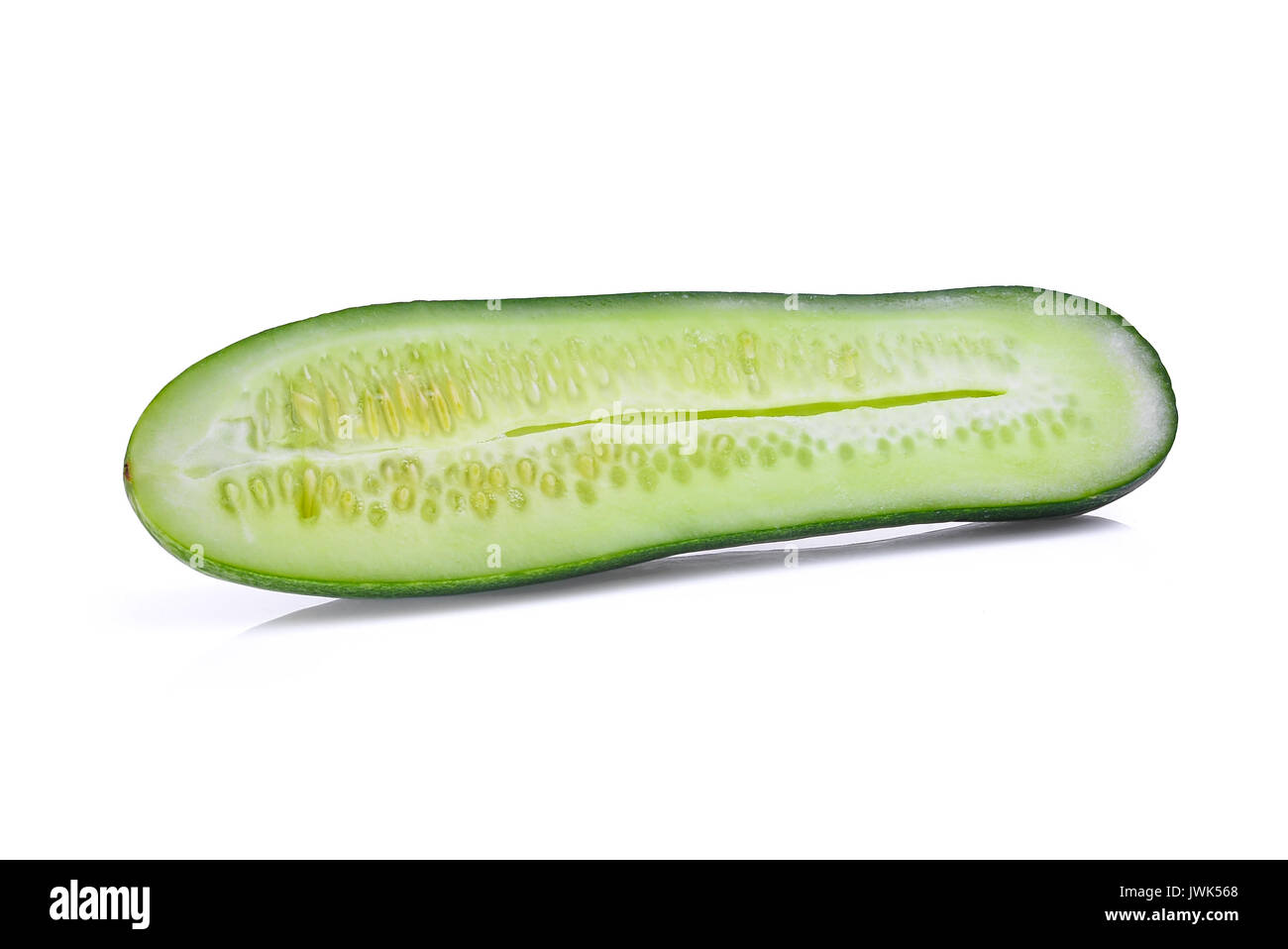 half of cucumber isolated on white background Stock Photo - Alamy
