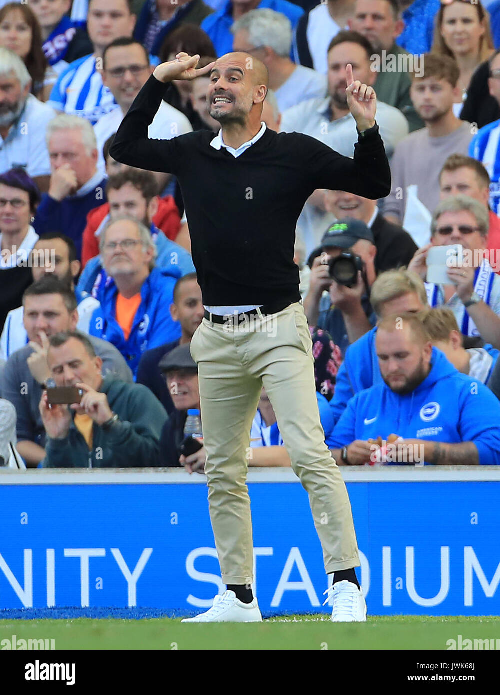 Manchester City manager Pep Guardiola gestures on the touchline during ...