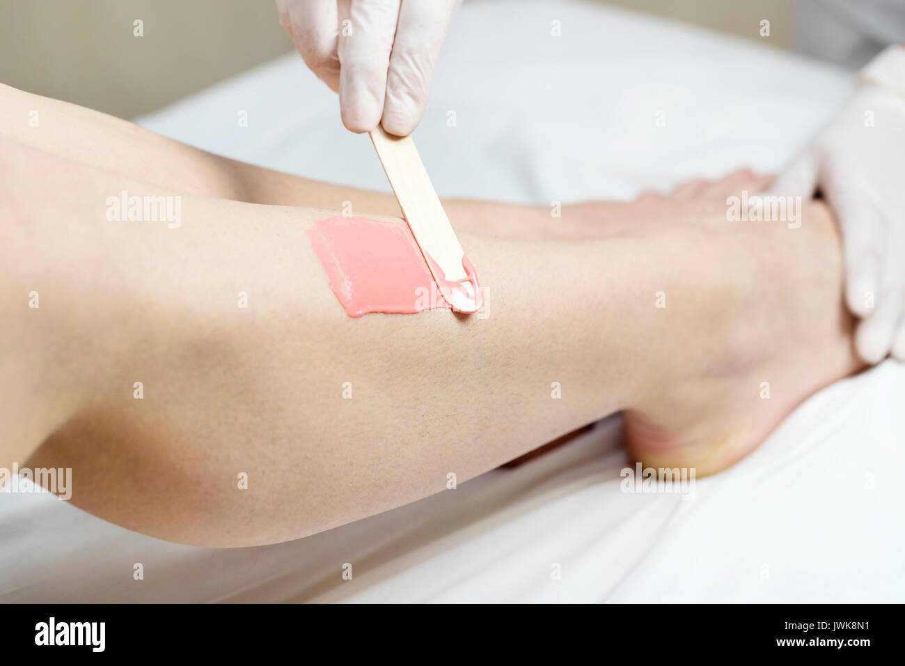 Process depilation female legs and hands in a beauty salon Stock Photo ...