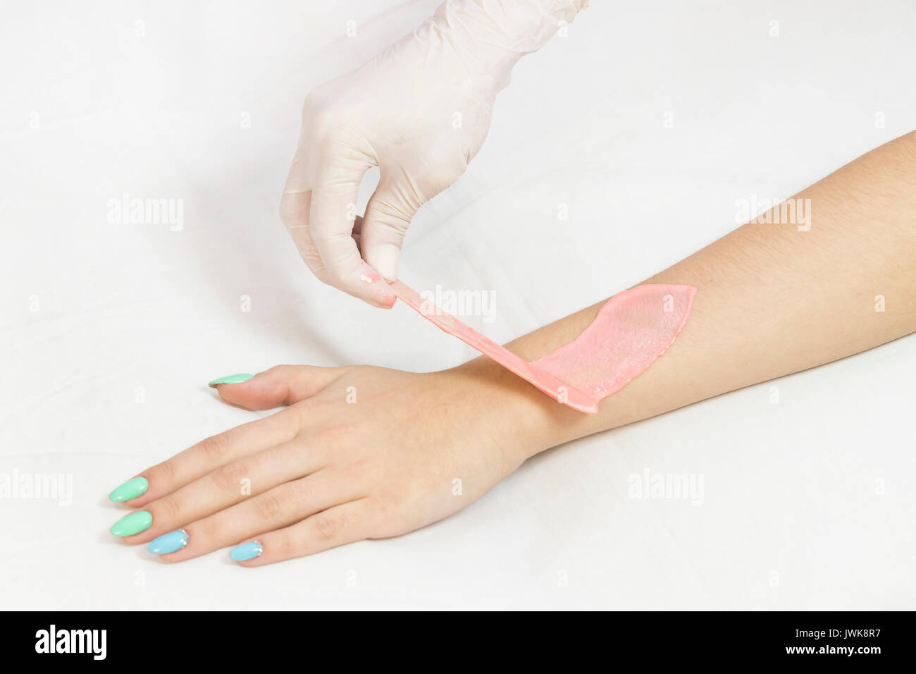 Process depilation female legs and hands in a beauty salon Stock Photo ...