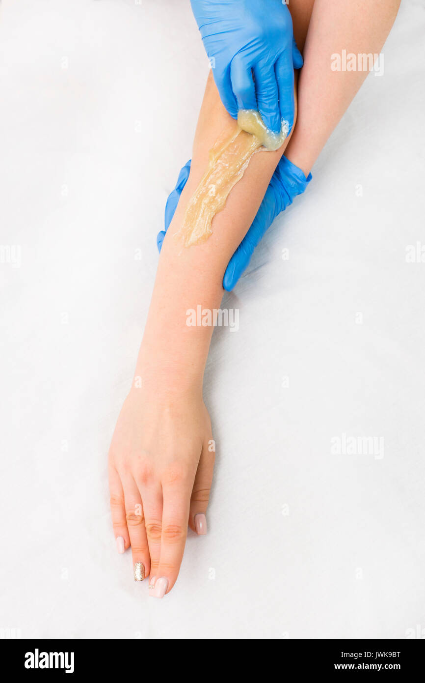 Depilation sugar processes woman hi-res stock photography and images ...