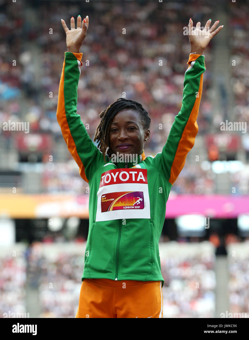 Ivory Coast's Marie-Josee Ta Lou celebrates with the silver medal on ...