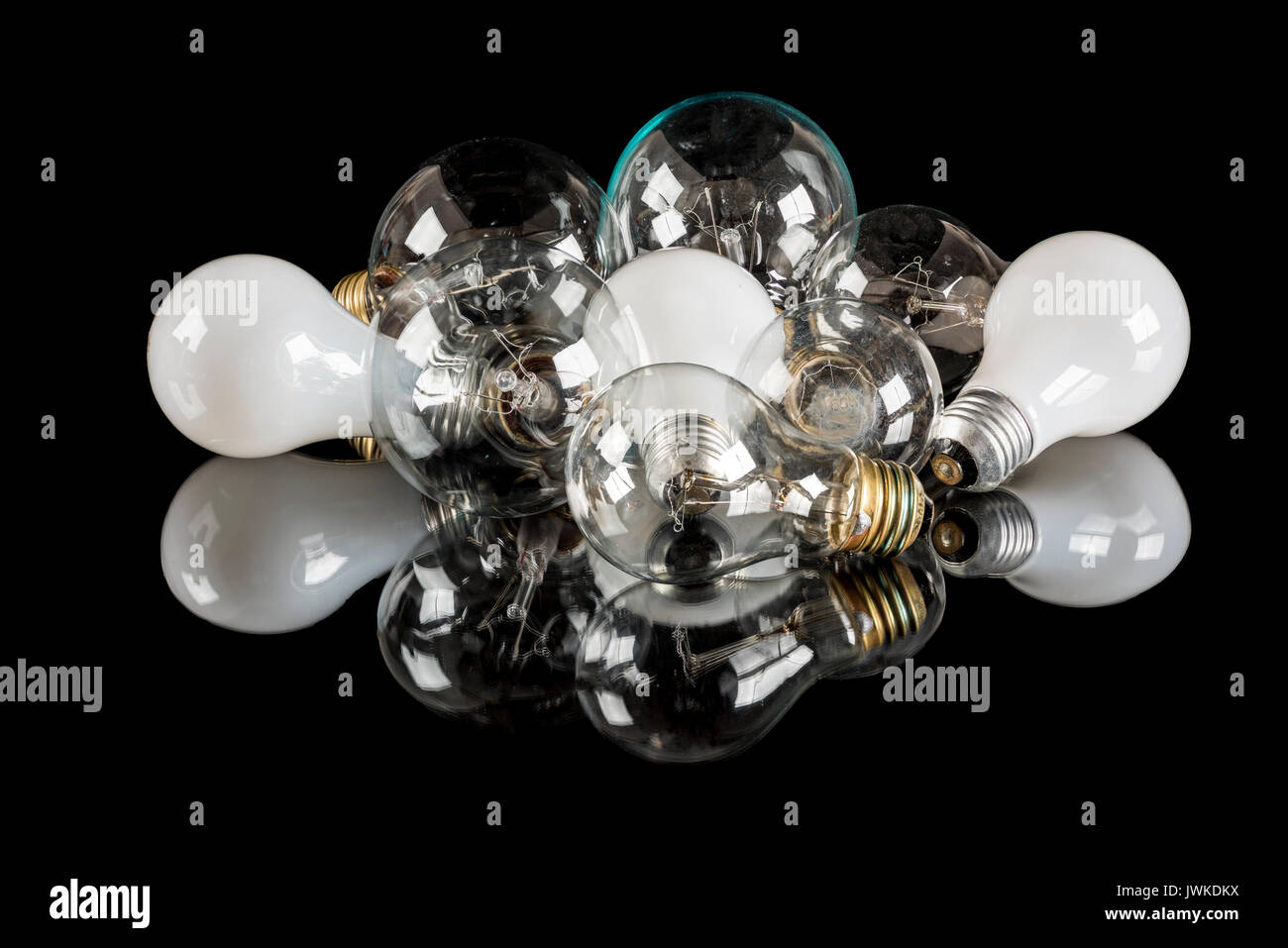 Glass bulbs that make light on a reflective surface Stock Photo - Alamy