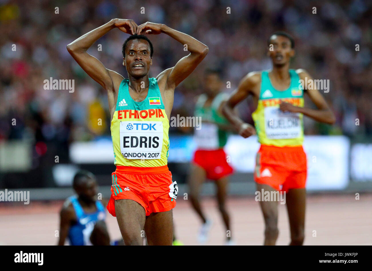 Ethiopias muktar edris crosses finish line hi-res stock photography and ...