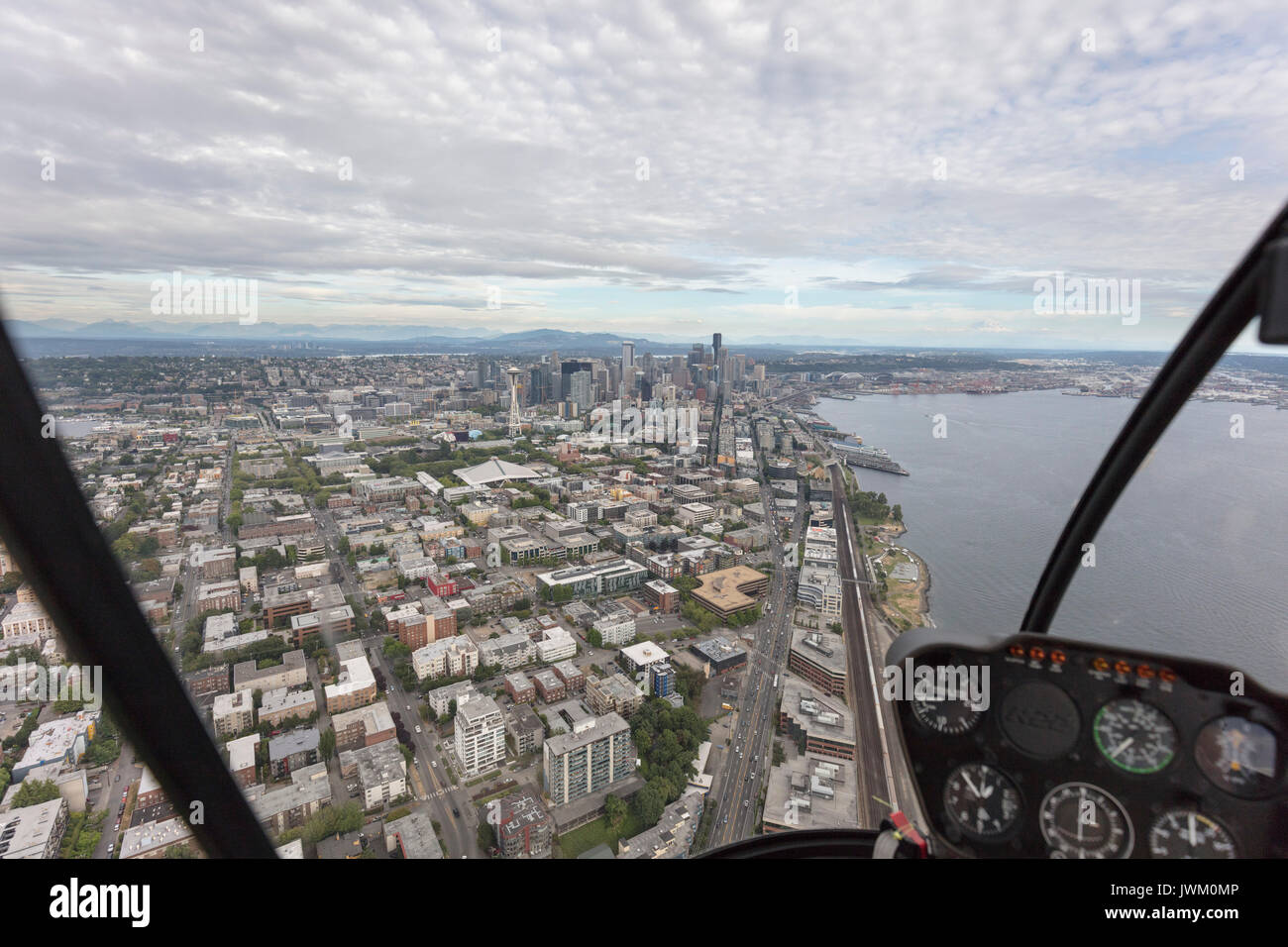 aerial view from helicopter of the Space Needle, Seattle Center and ...
