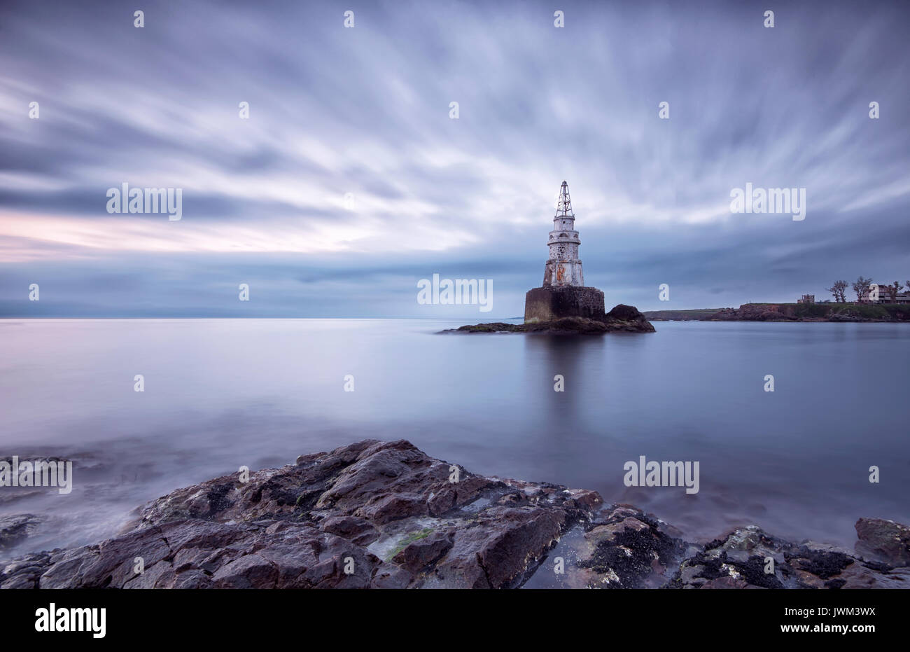Sunrise of the lighthouse in Ahtopol, Bulgaria. Blue hour seascape ...
