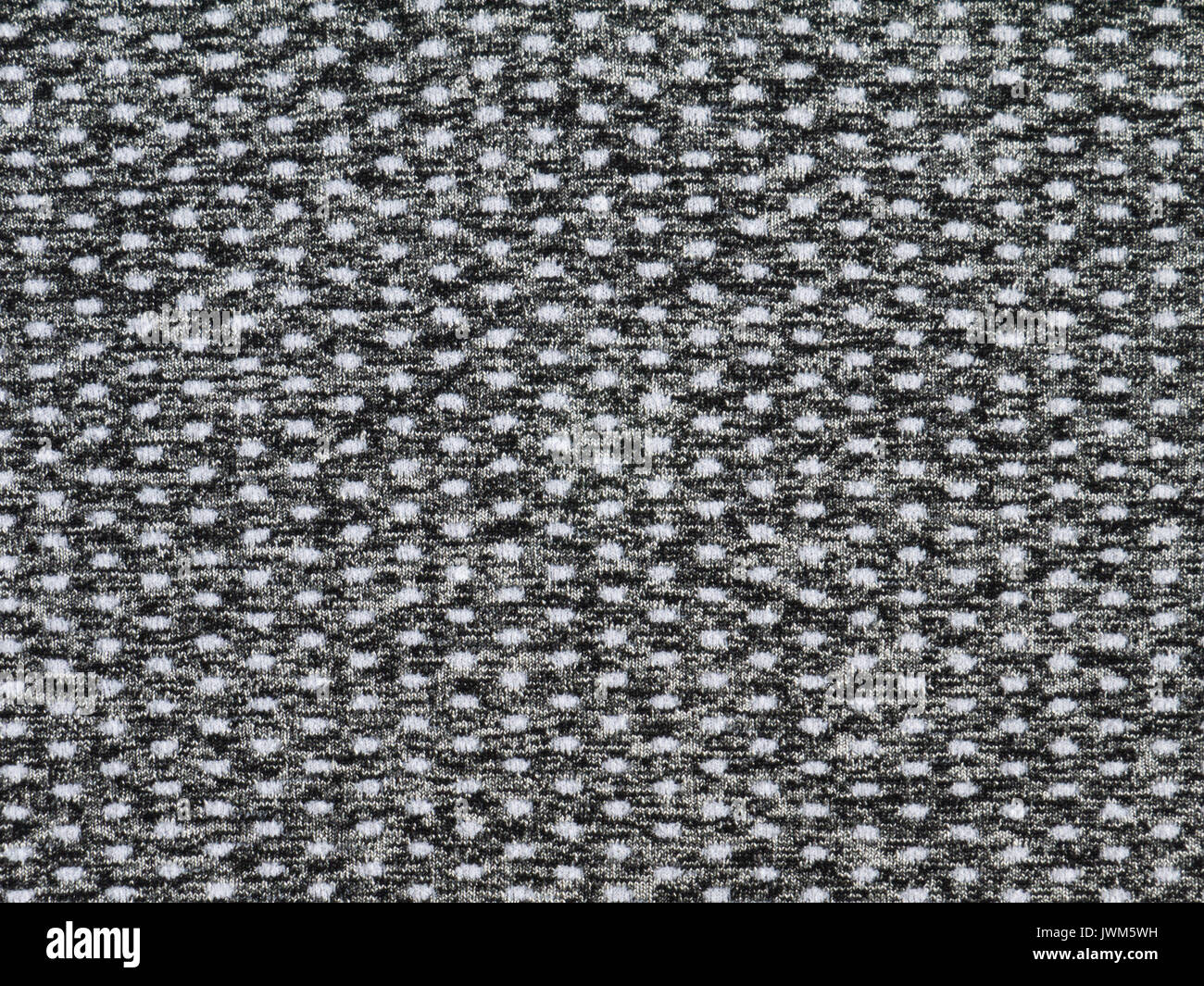 Gray spotted sportwear knitted fabric texture swatch Stock Photo - Alamy