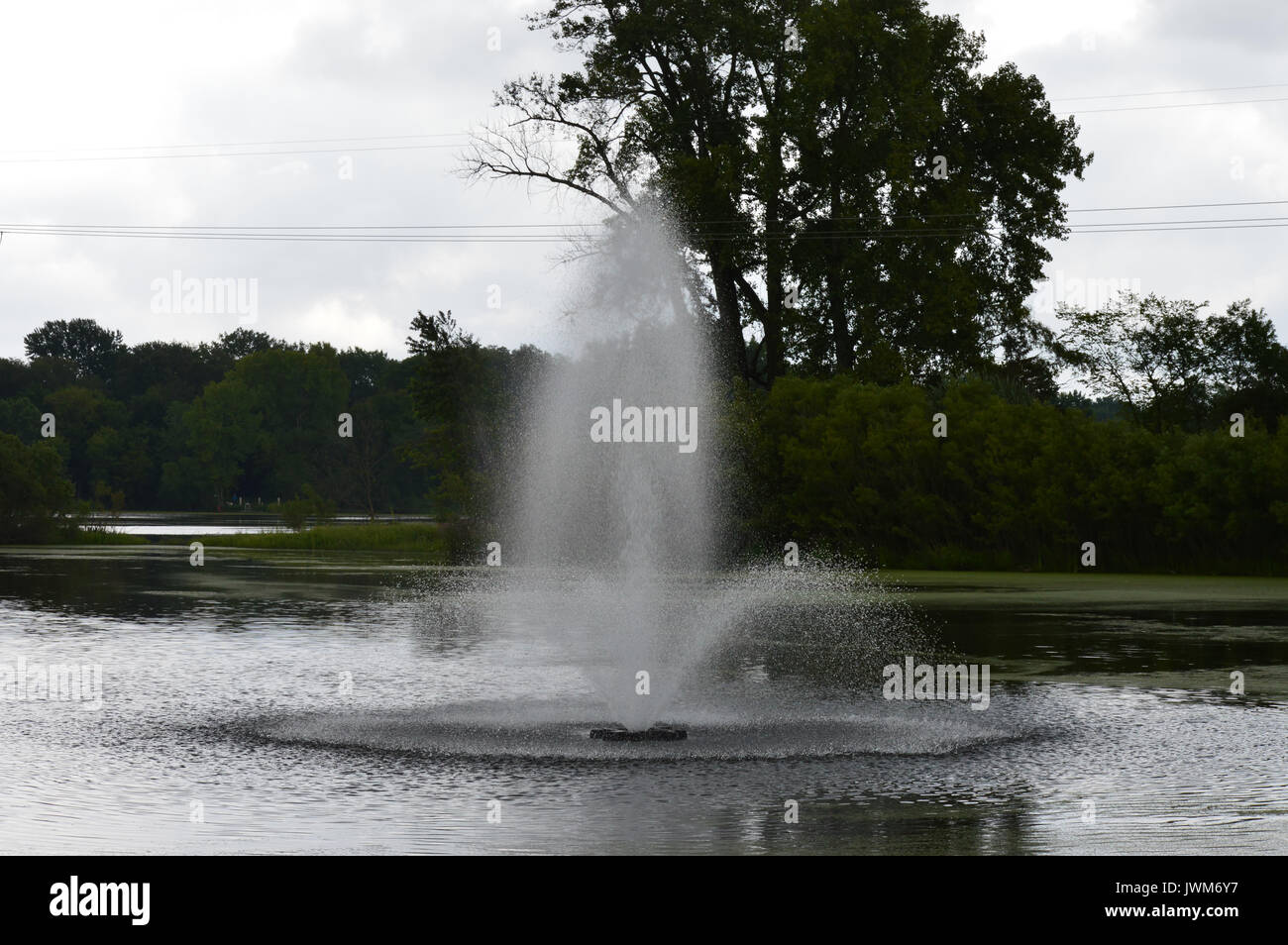 Water fountain in the lake Stock Photo - Alamy
