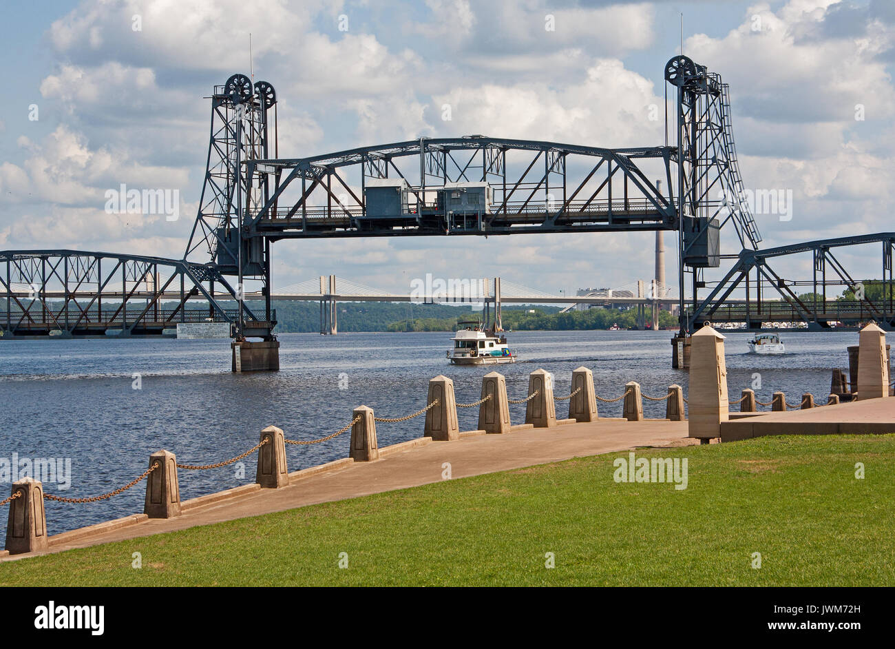 Boat going under the lift bridge on the St. Croix river at Stillwater ...