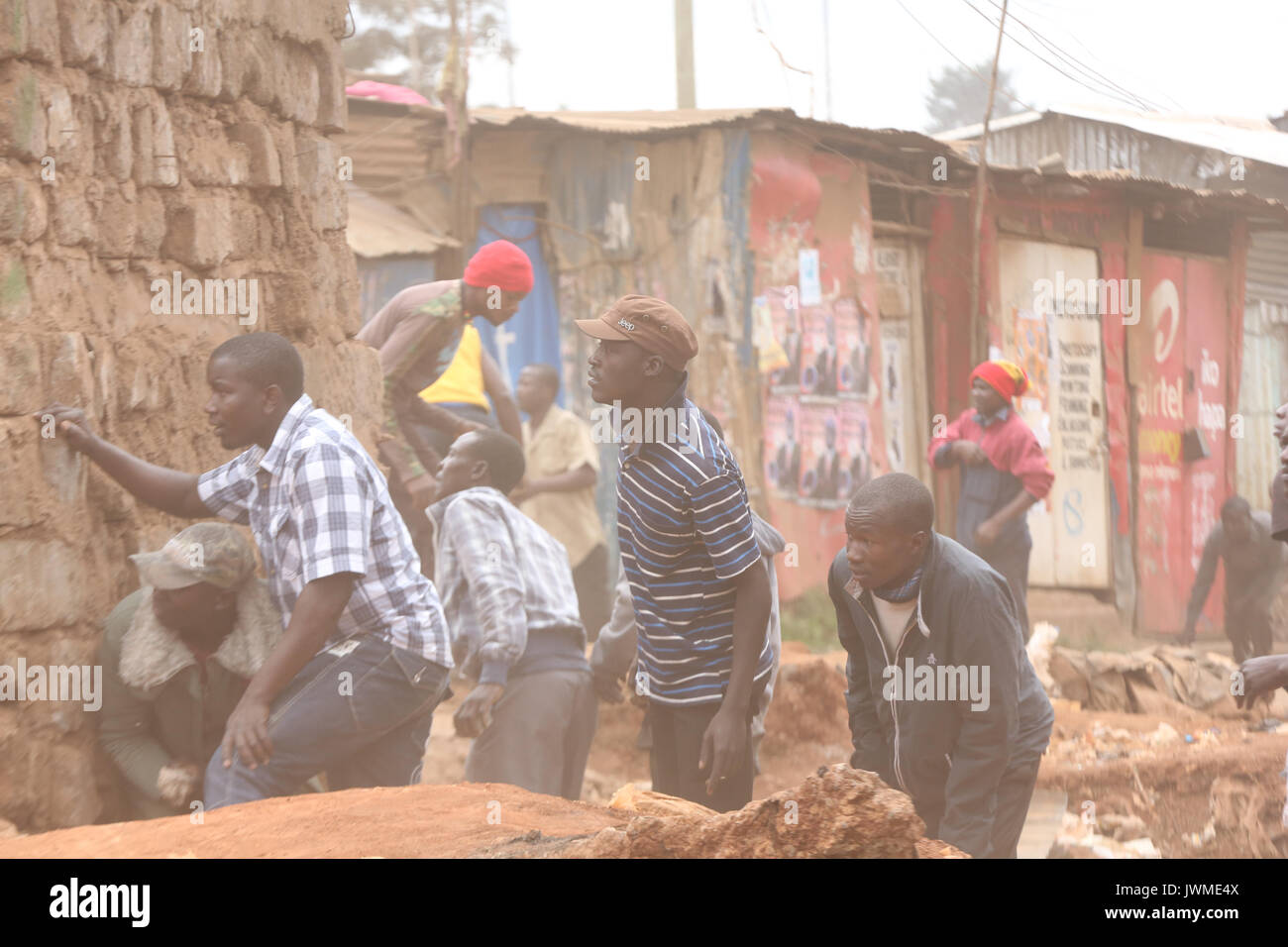 Nairobi, Kenya. 12th Aug, 2017. NASA supporters pelt security personnel ...