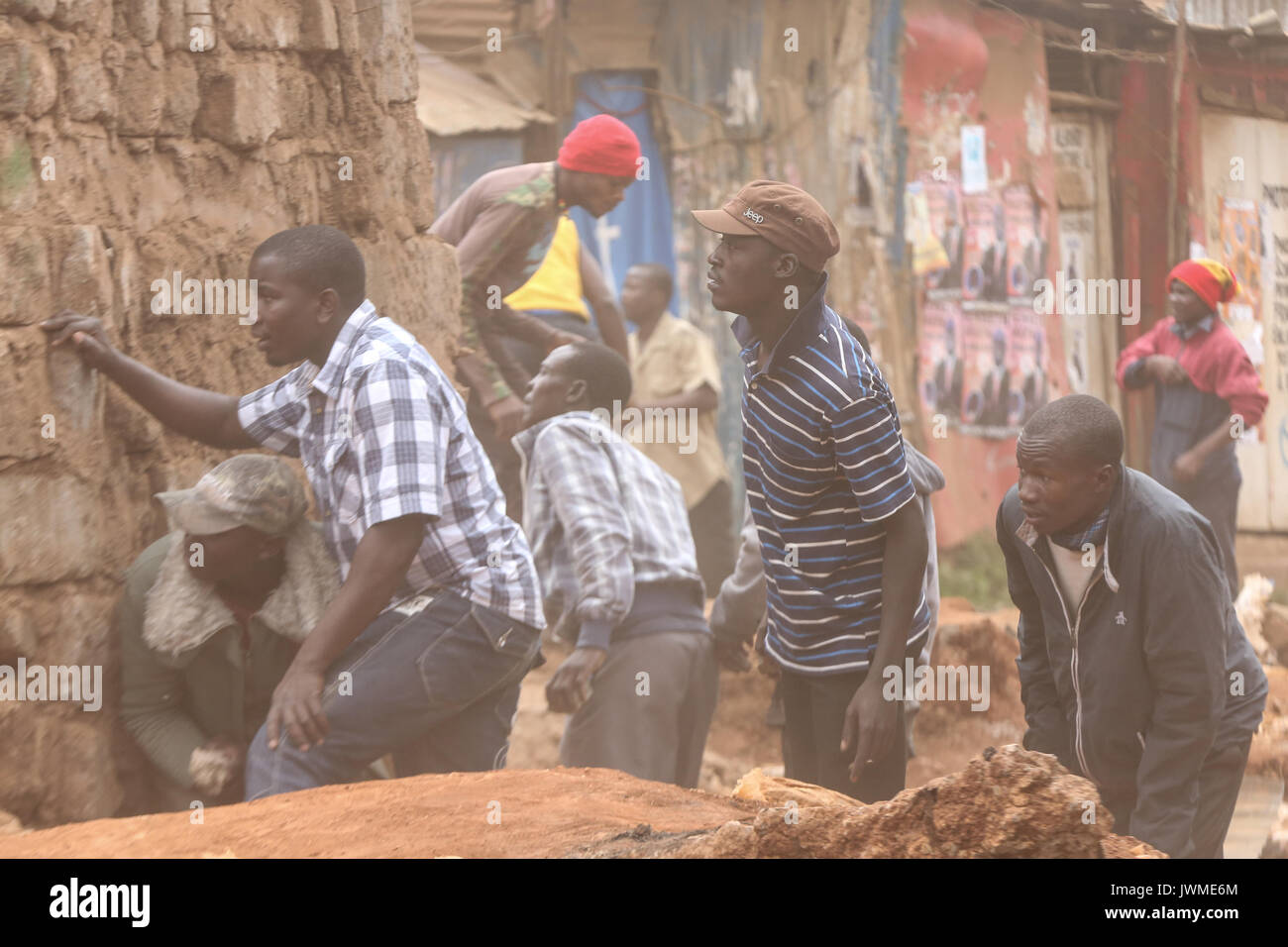 Nairobi, Kenya. 12th Aug, 2017. NASA supporters pelt security personnel ...