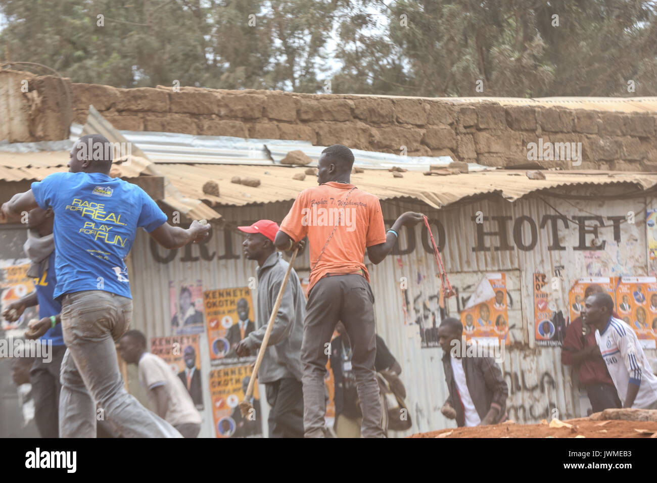Nairobi, Kenya. 12th Aug, 2017. NASA supporters pelt security personnel ...