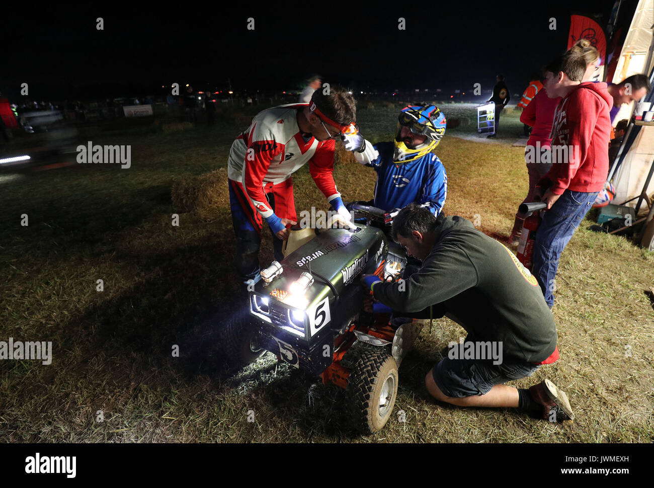 Team members from Sussex Slackers make a driver change and re-fuel ...