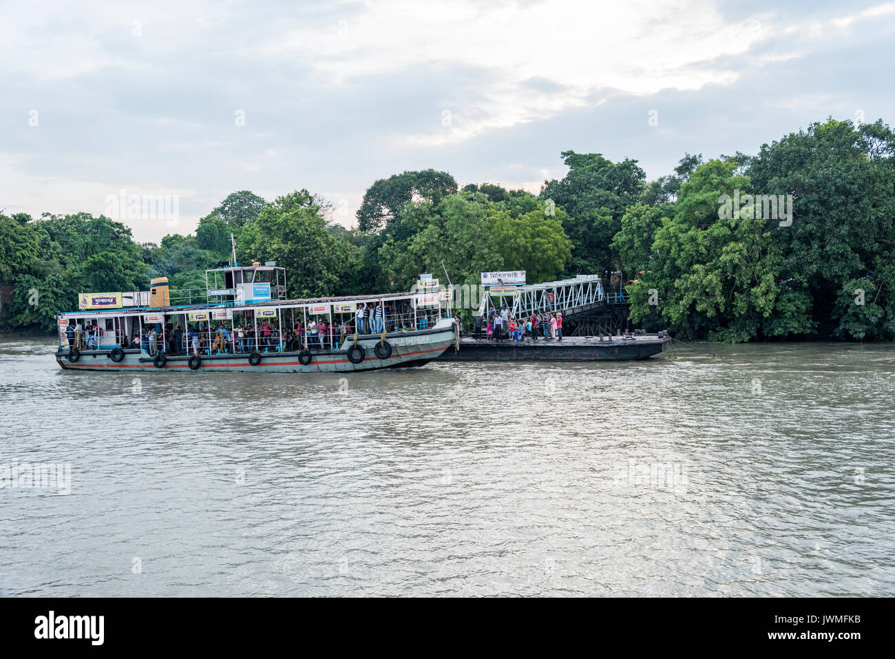 A small boat or ferry in a river in Kolkata, India Stock Photo - Alamy