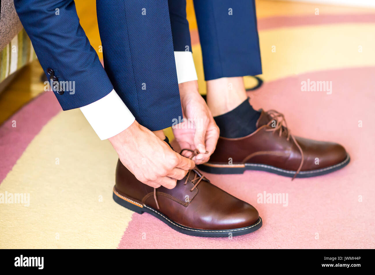 The man wears shoes Stock Photo - Alamy