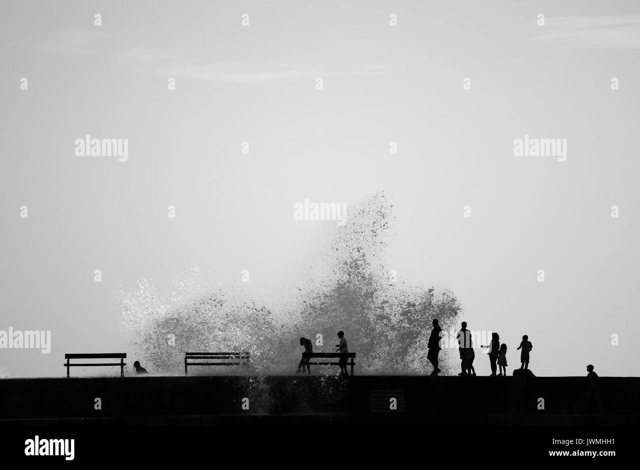 Kids playing with waves hi-res stock photography and images - Alamy