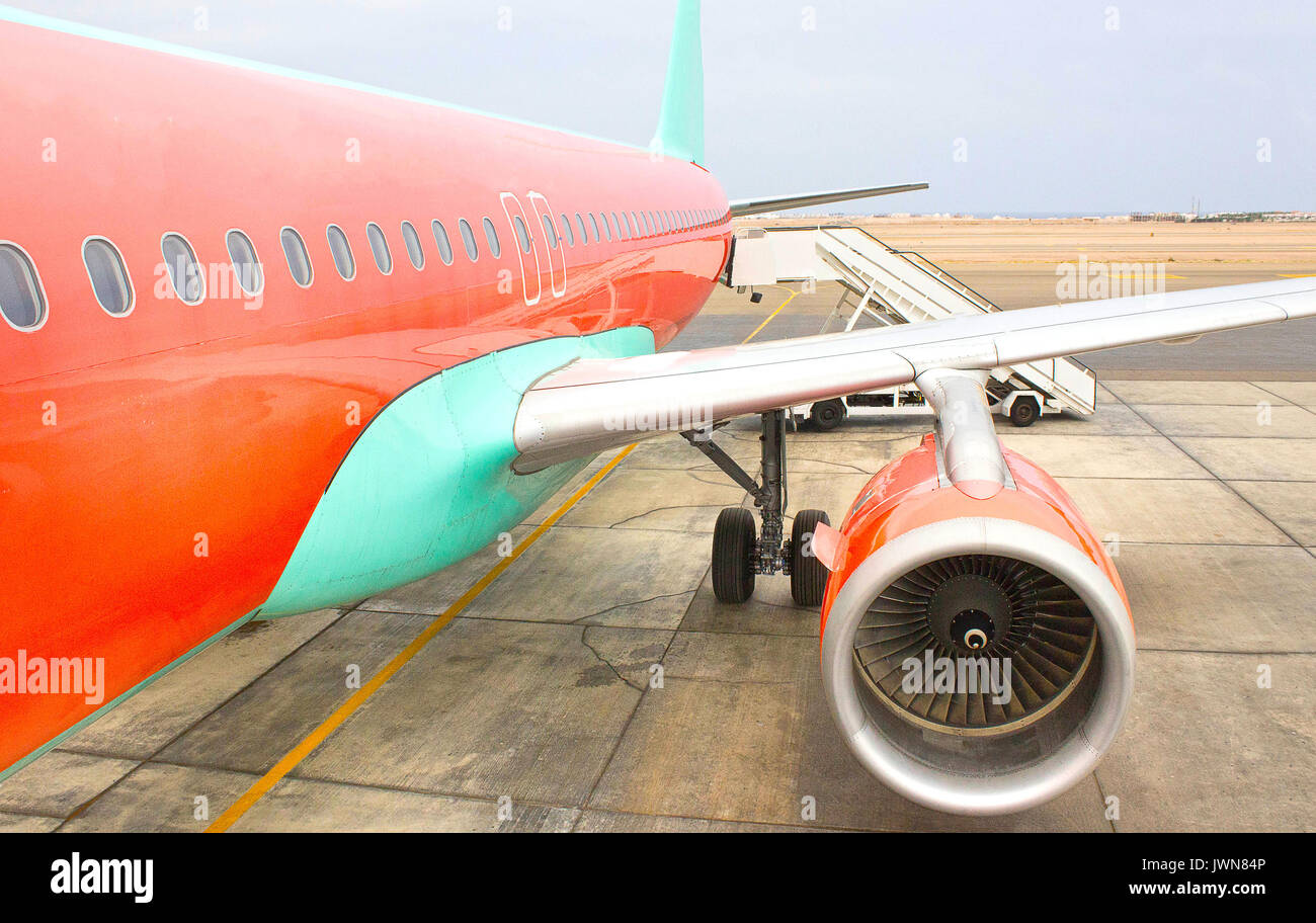 Airplane being preparing ready for takeoff in international airport Stock Photo - Alamy