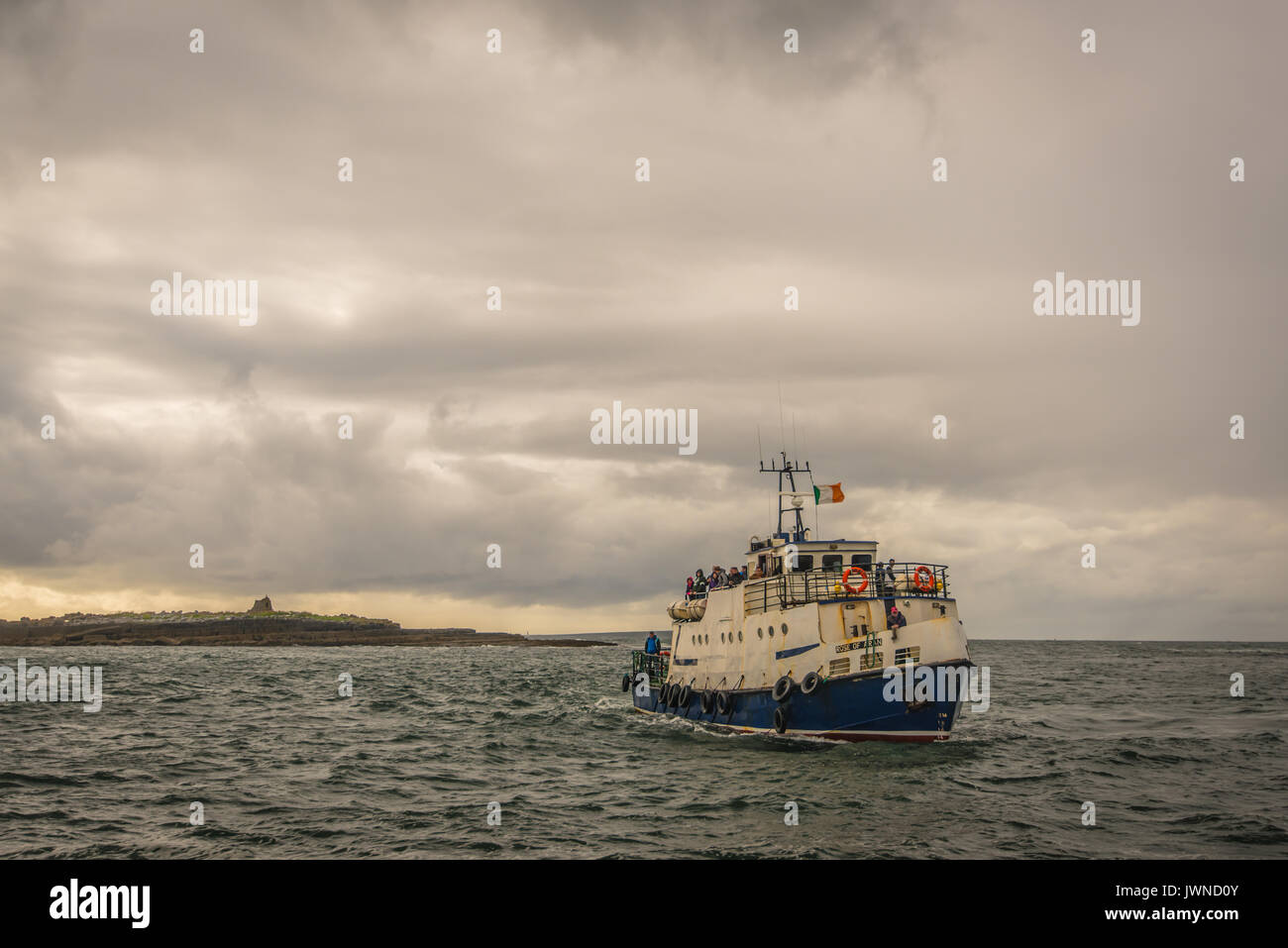 Doolin Ferry Boat off of Irish Coastline in a Storm Stock Photo - Alamy