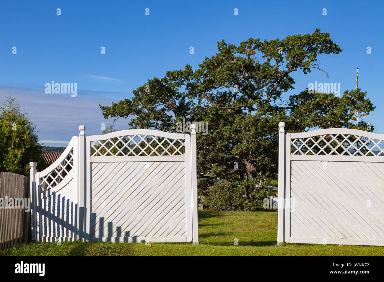 White wooden gates hi-res stock photography and images - Alamy