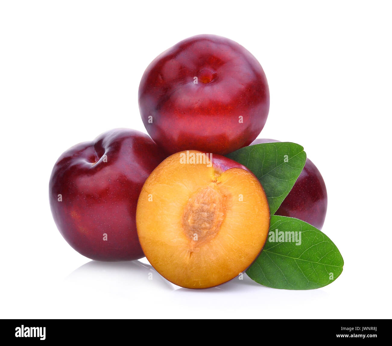 red cherry plum with green leaves isolated on white background Stock ...