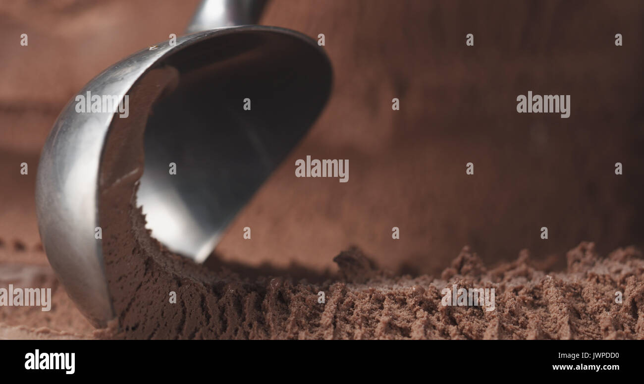 closeup scooping chocolate ice cream, wide photo Stock Photo - Alamy