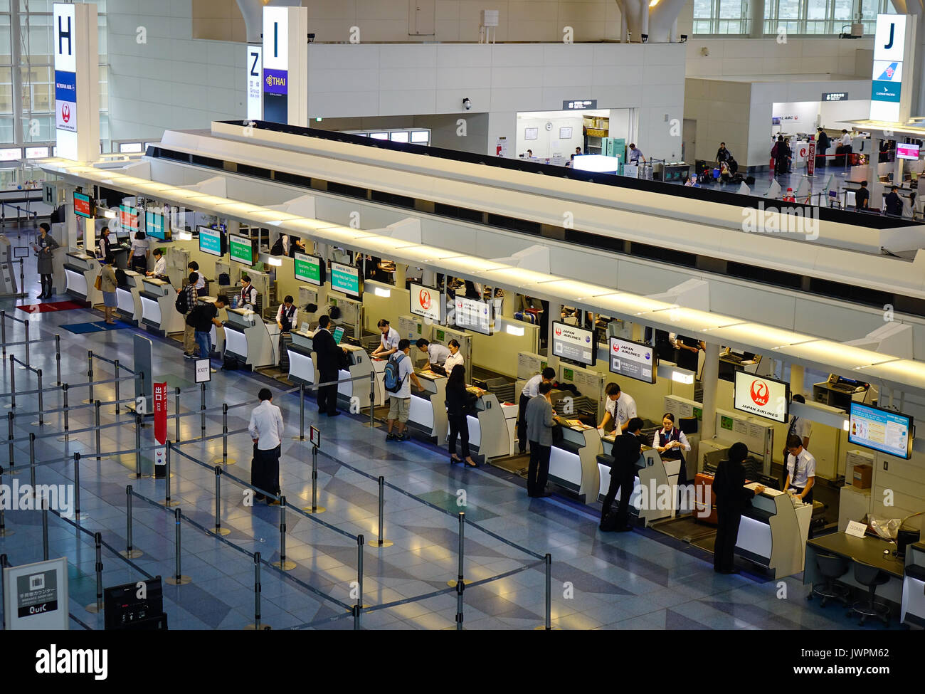 Tokyo, Japan - May 15, 2017. People waiting at Check-in Counters of ...