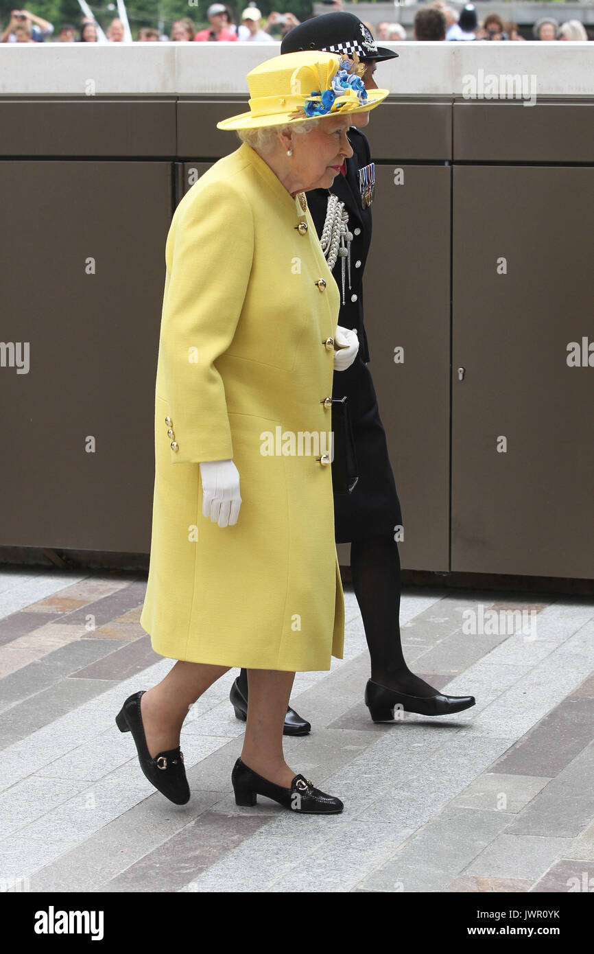 Her Majesty The Queen, accompanied by His Royal Highness The Duke of ...