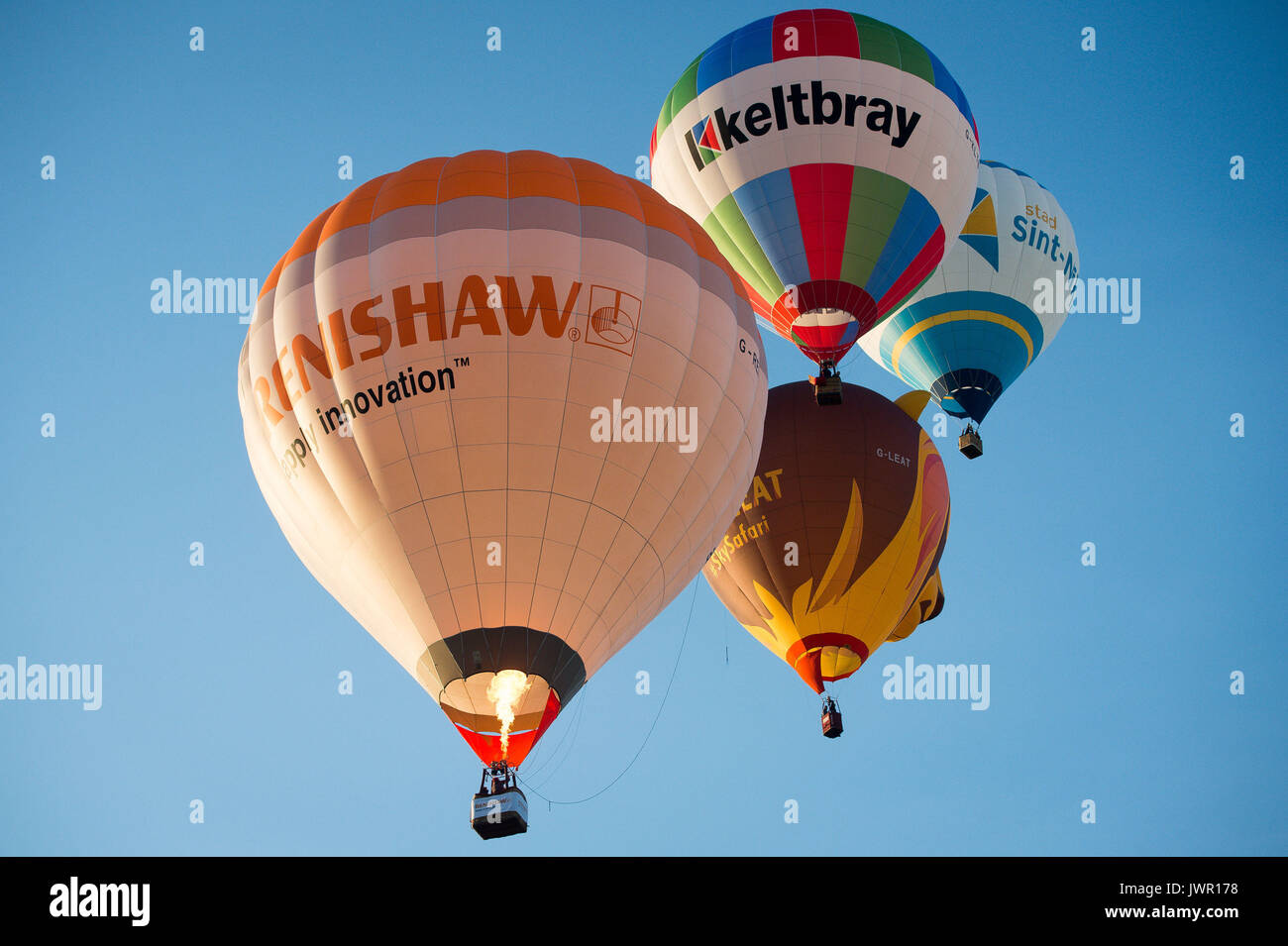 Hot air balloons fly over Bristol during the mass ascent, where ...