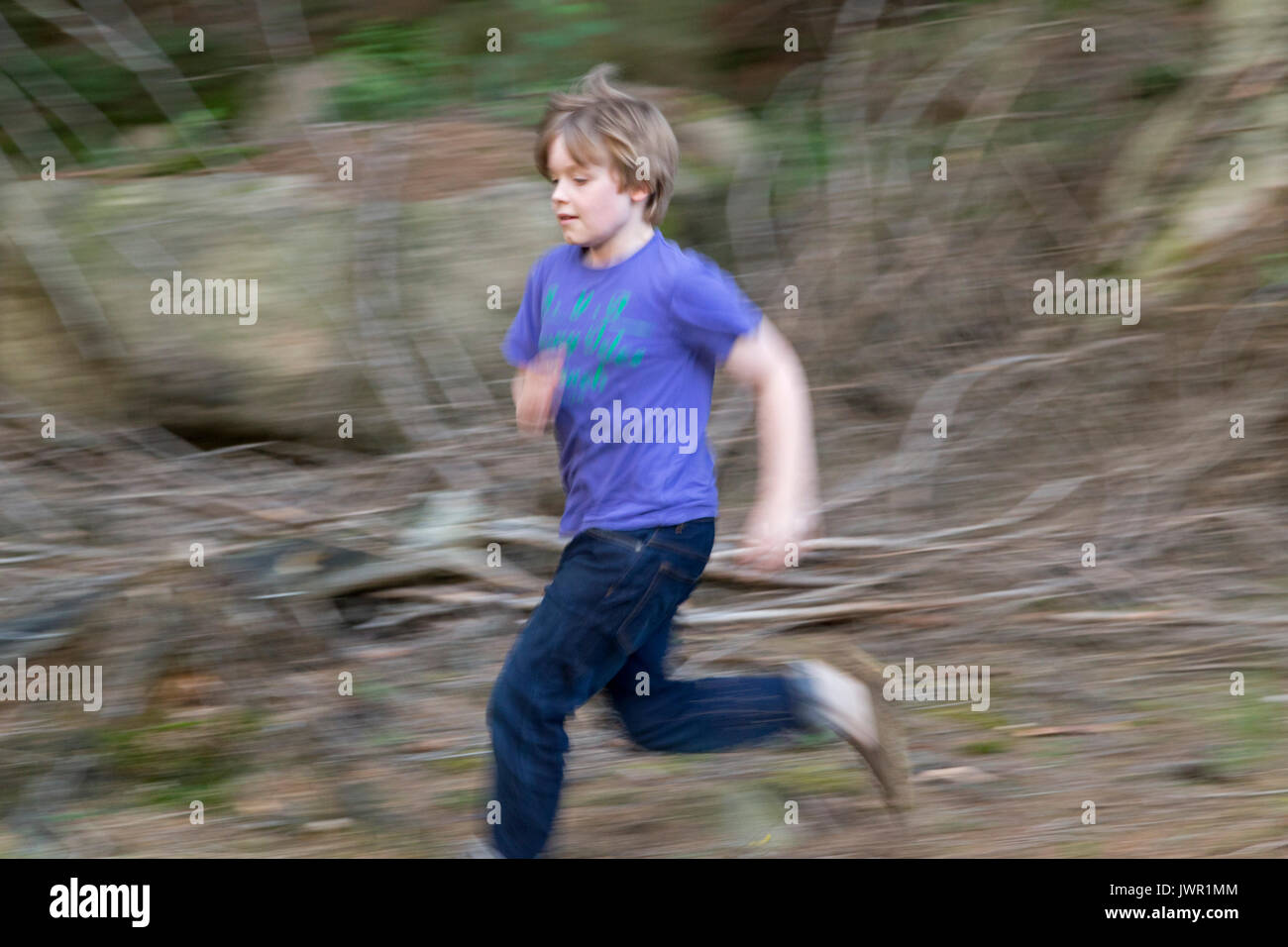 Running boy hi-res stock photography and images - Alamy