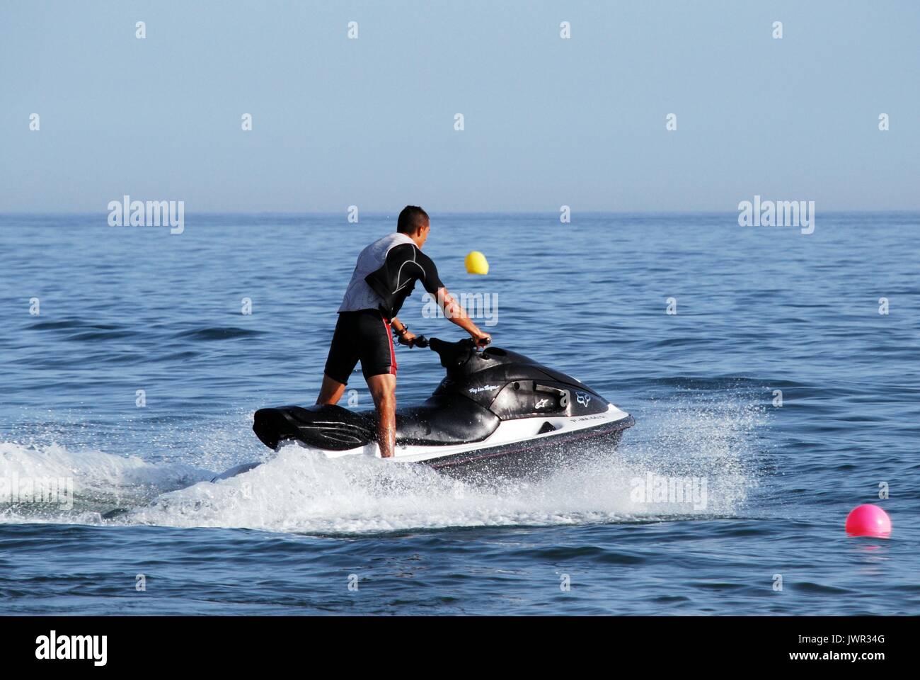Man riding a jet ski hi-res stock photography and images - Alamy