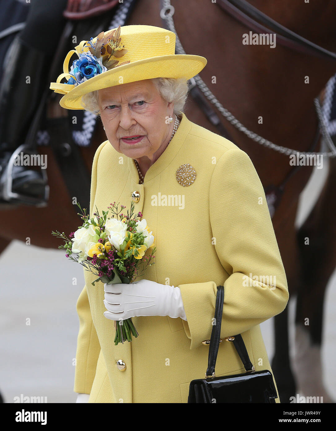 Her Majesty The Queen, accompanied by His Royal Highness The Duke of ...