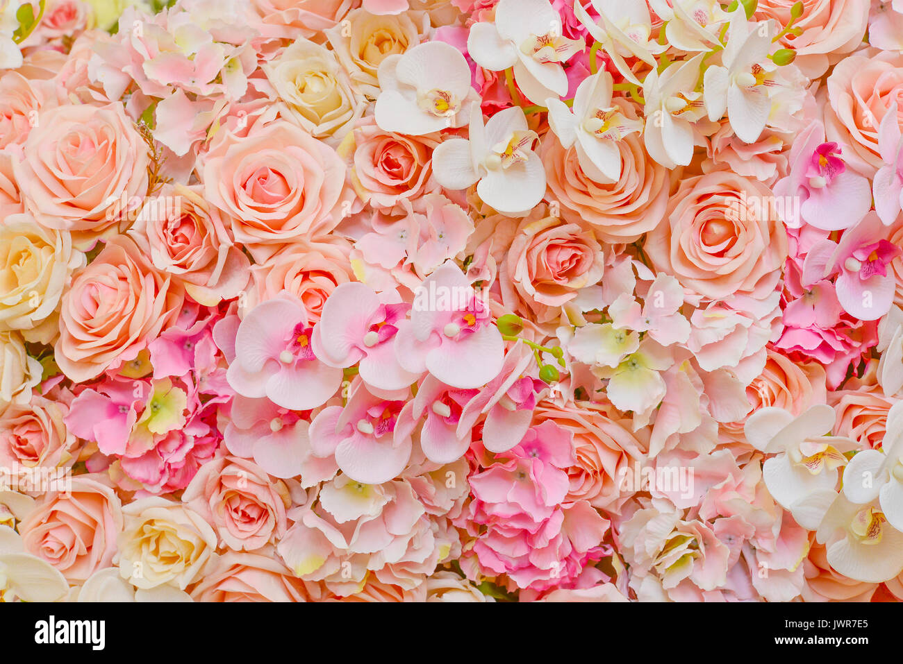 fake flowers of beautiful pink roses and orchids for wedding decoration ...