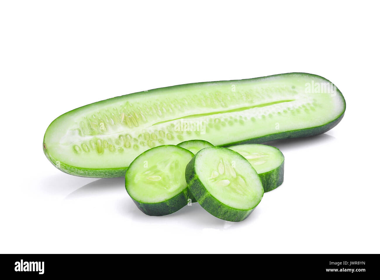 half and slice of cucumber isolated on white background Stock Photo - Alamy